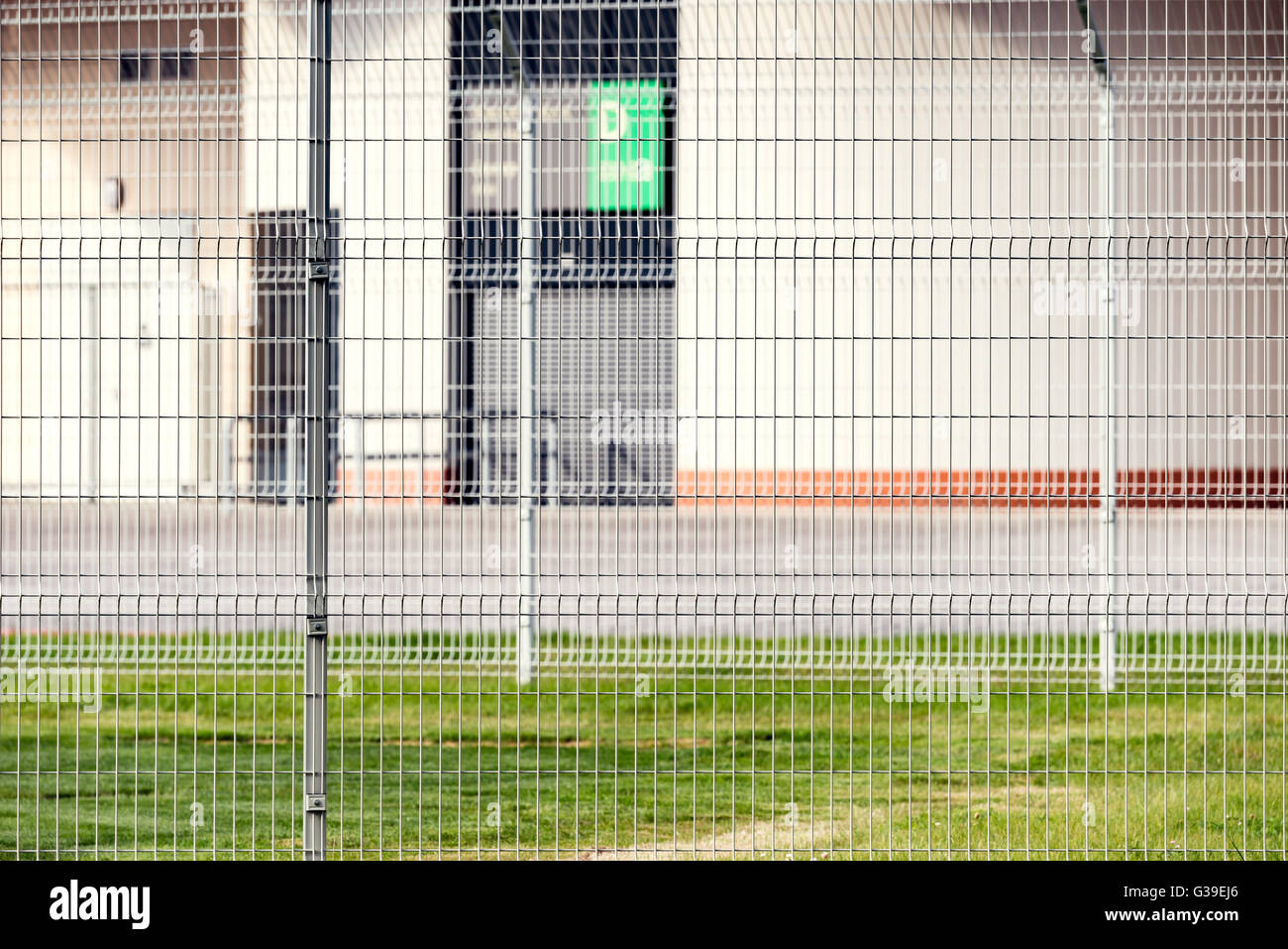 Metal fence by the stadium entrance at day time Stock Photo - Alamy