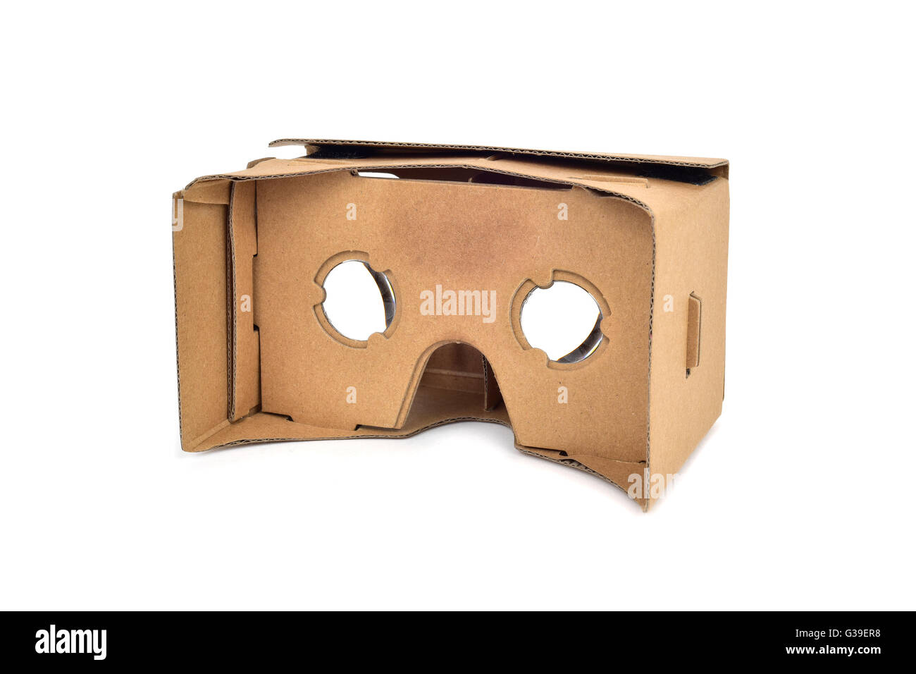 closeup of a pair cardboard virtual reality lenses on a white ...