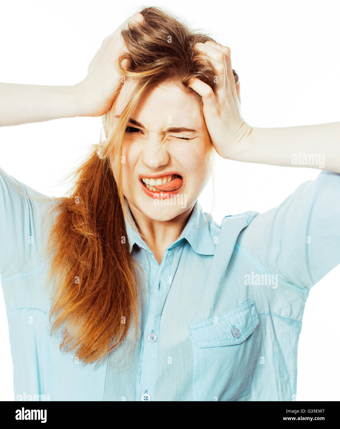 cute young woman making cheerful faces on white background, mess Stock ...
