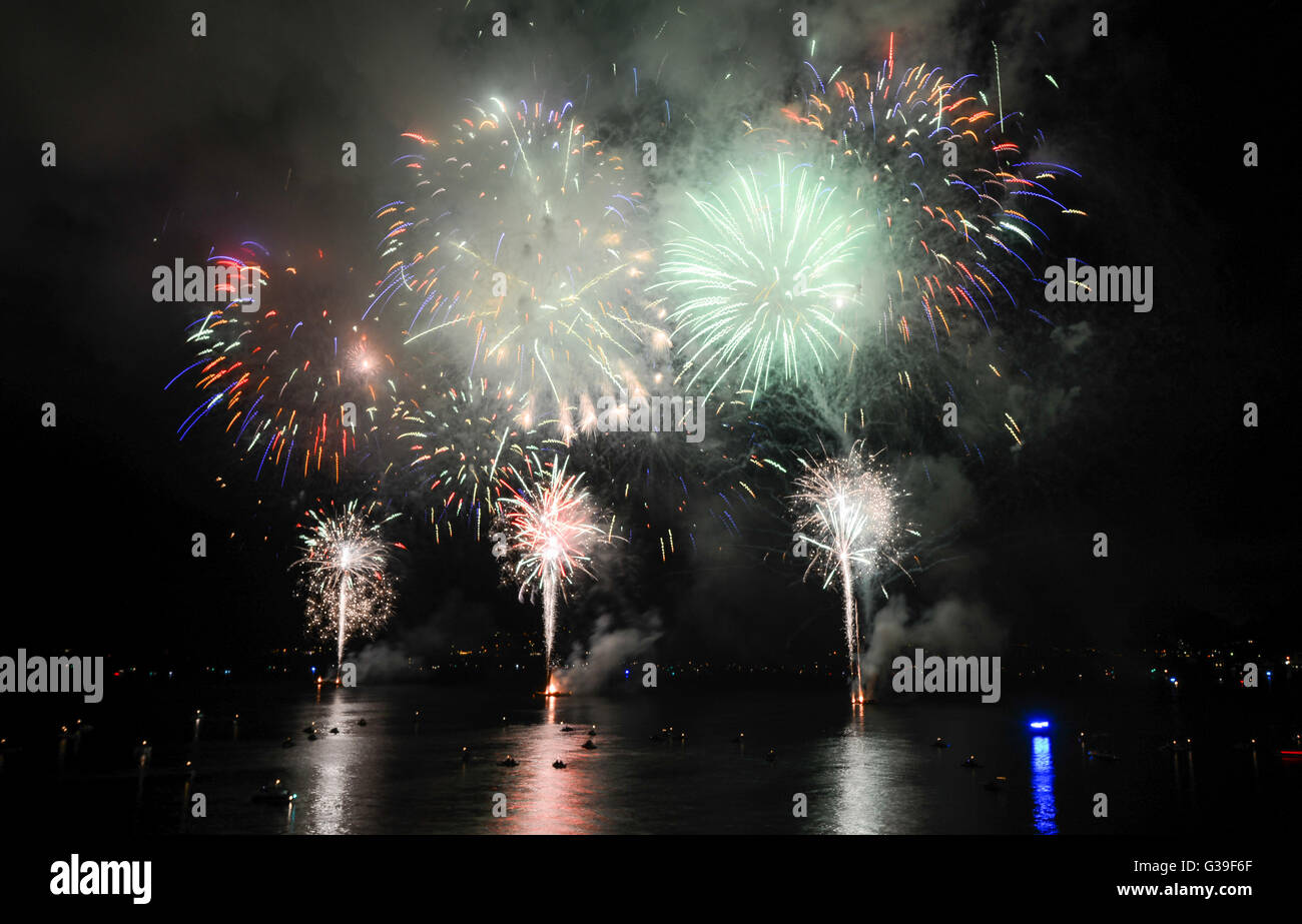 Brightly colorful fireworks in the night sky Stock Photo - Alamy