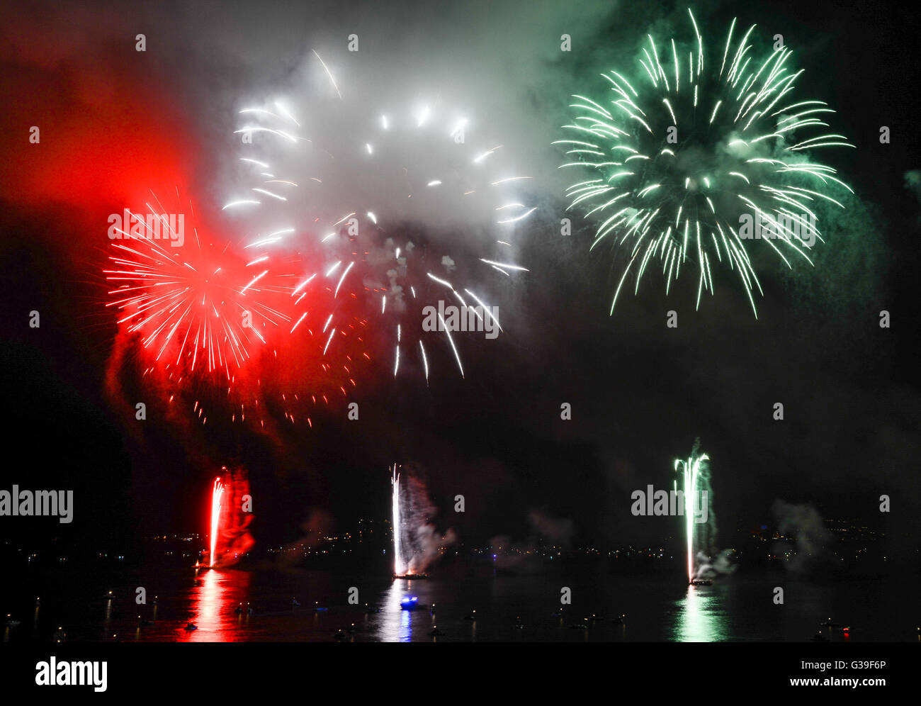 Brightly colorful fireworks in the night sky Stock Photo - Alamy