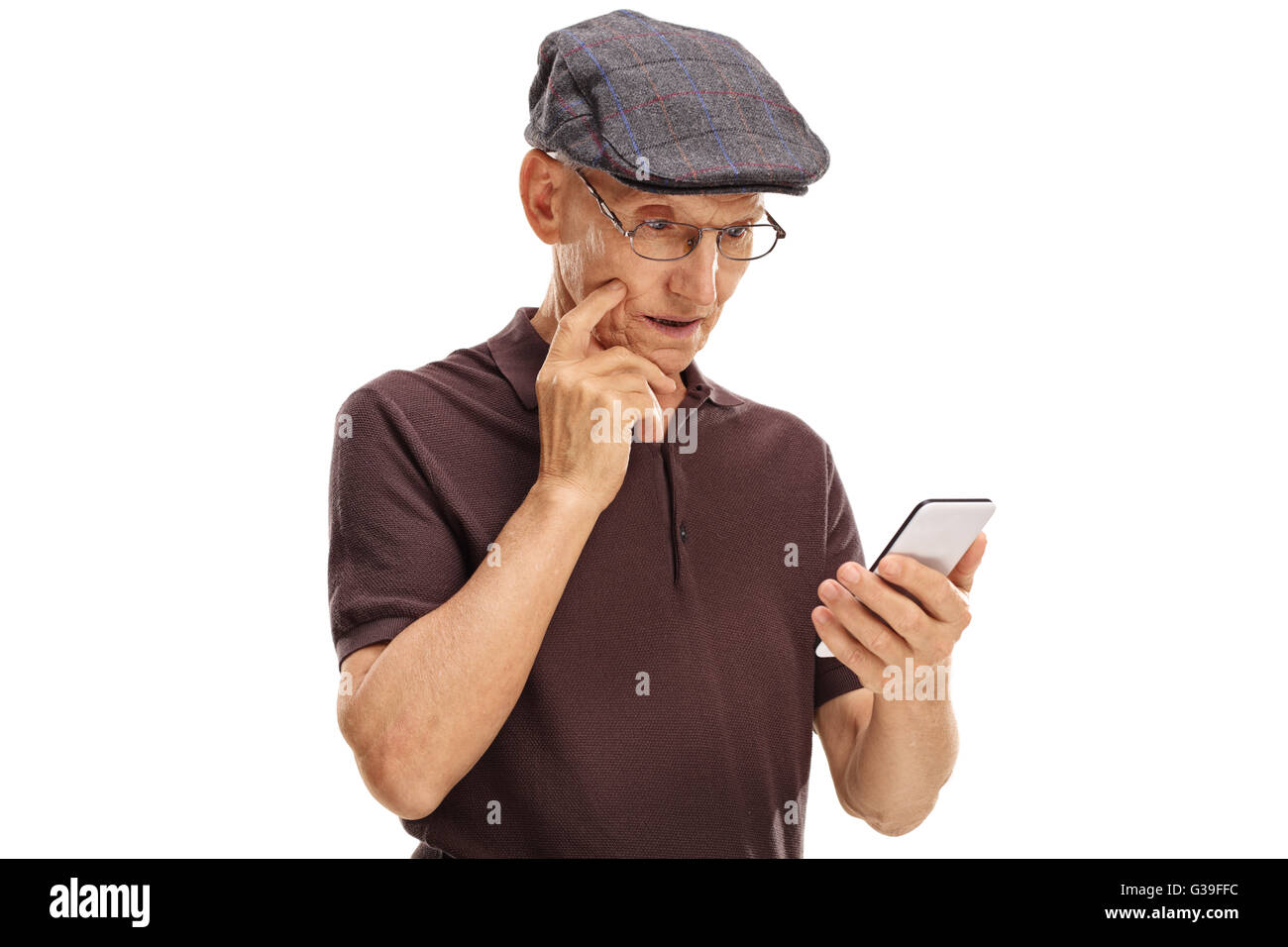 Confused senior gentleman looking at his cell phone isolated on white ...