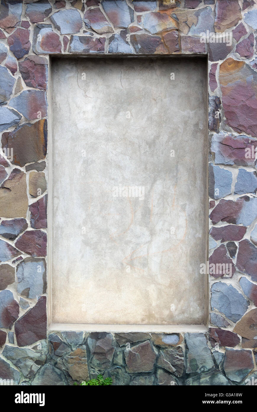 frame in the wall is made of pieces of stone Stock Photo - Alamy