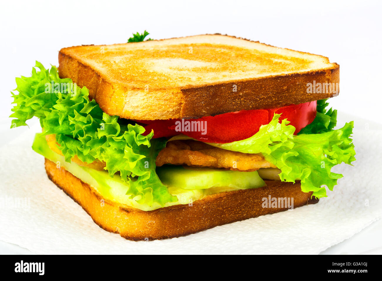 crispy toast with steak, tomato and lettuce Stock Photo - Alamy