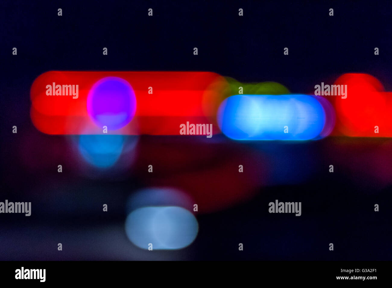 abstract blur of red blue police car sirens at night Stock Photo - Alamy
