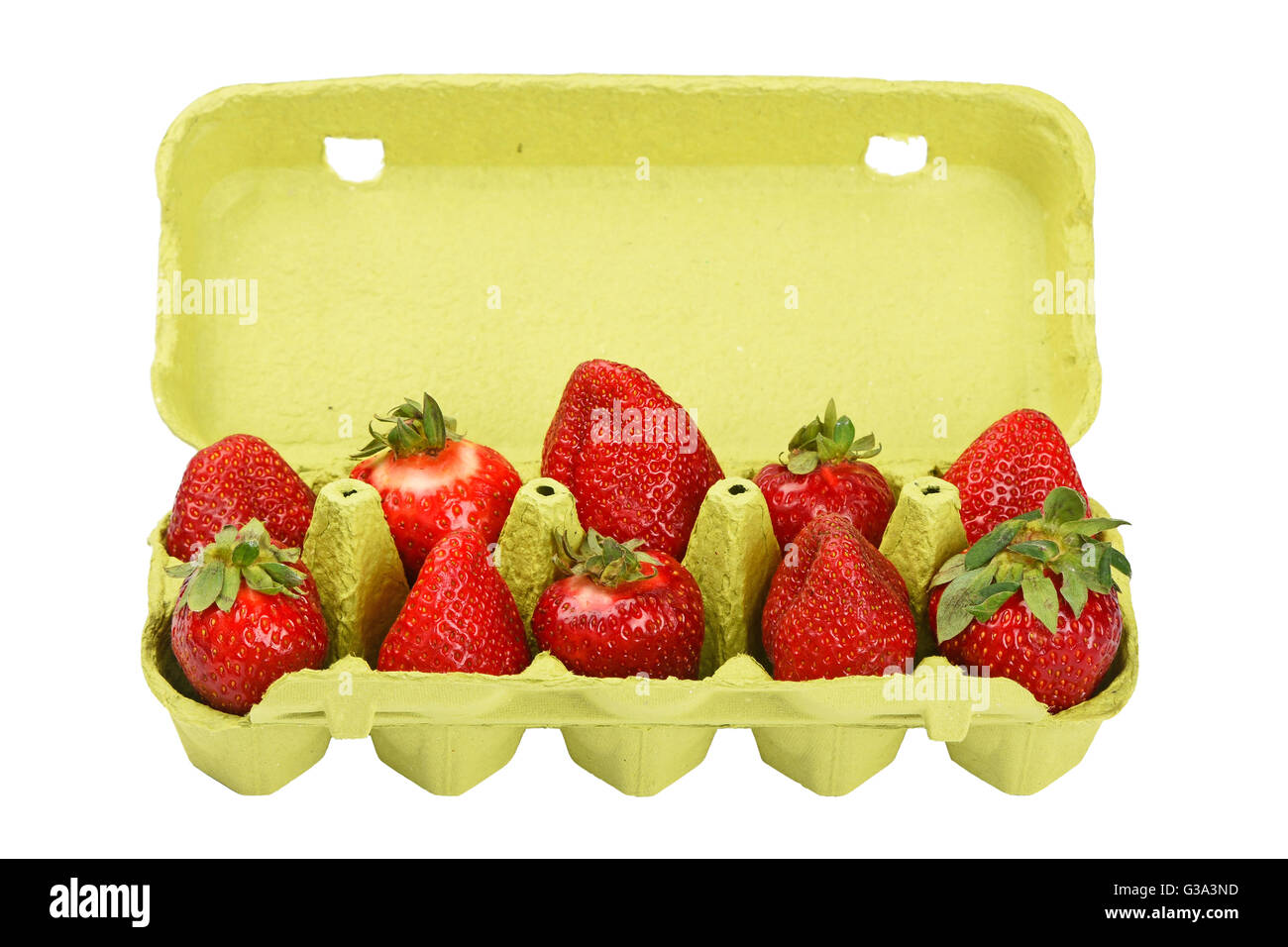 Red mellow strawberry in open green carton egg carrier container tray ...