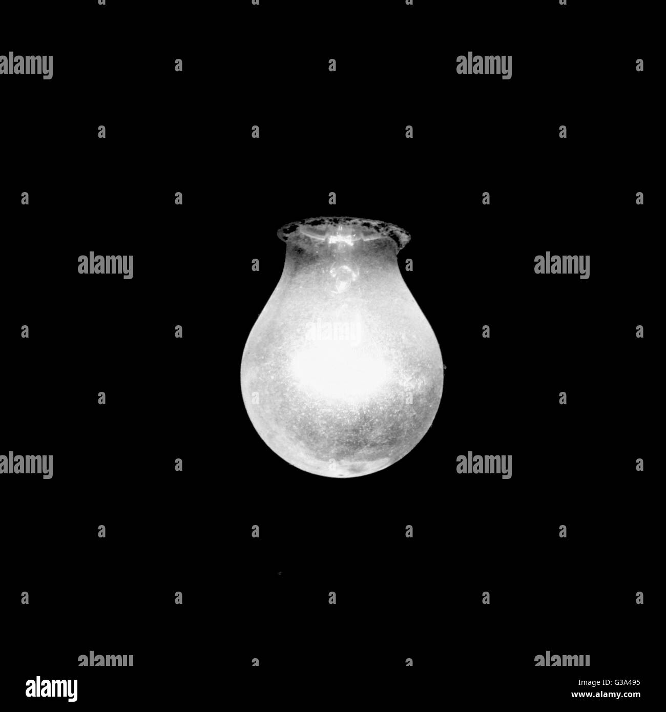 Old dusty bulb illuminated Stock Photo - Alamy