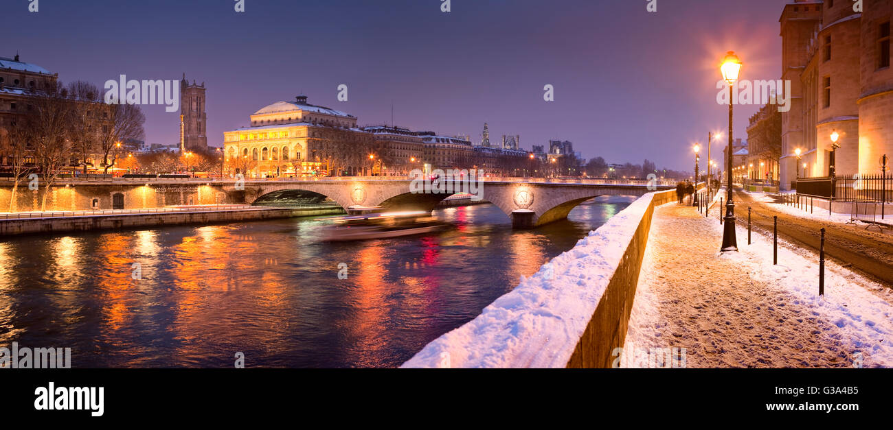 Snow in Paris, France, at night on the Ile de la Cite Stock Photo - Alamy
