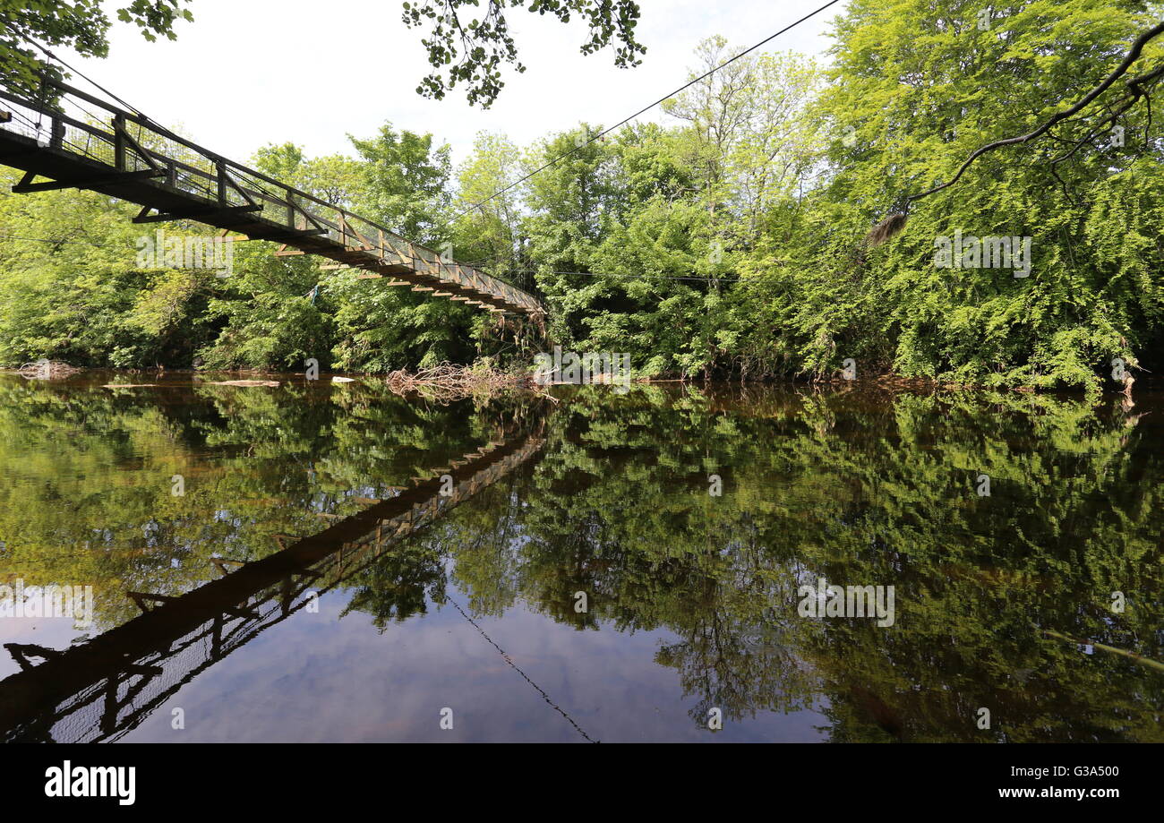 Suspension bridge over River North Esk near Edzell Angus Scotland June ...