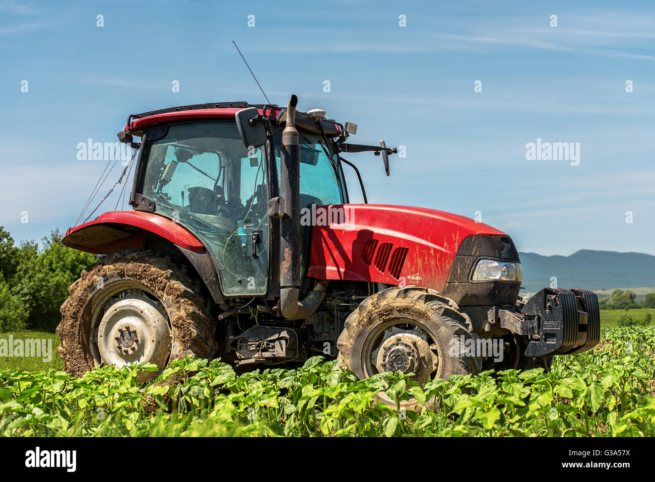 Harvesting work with tractor hi-res stock photography and images - Alamy