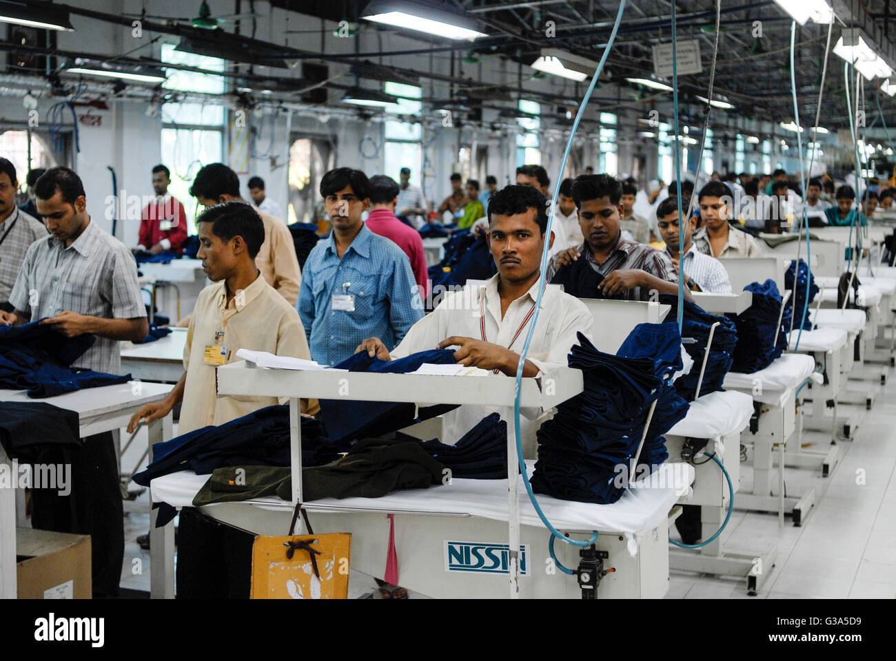 Working conditions in clothing factory hi-res stock photography and ...