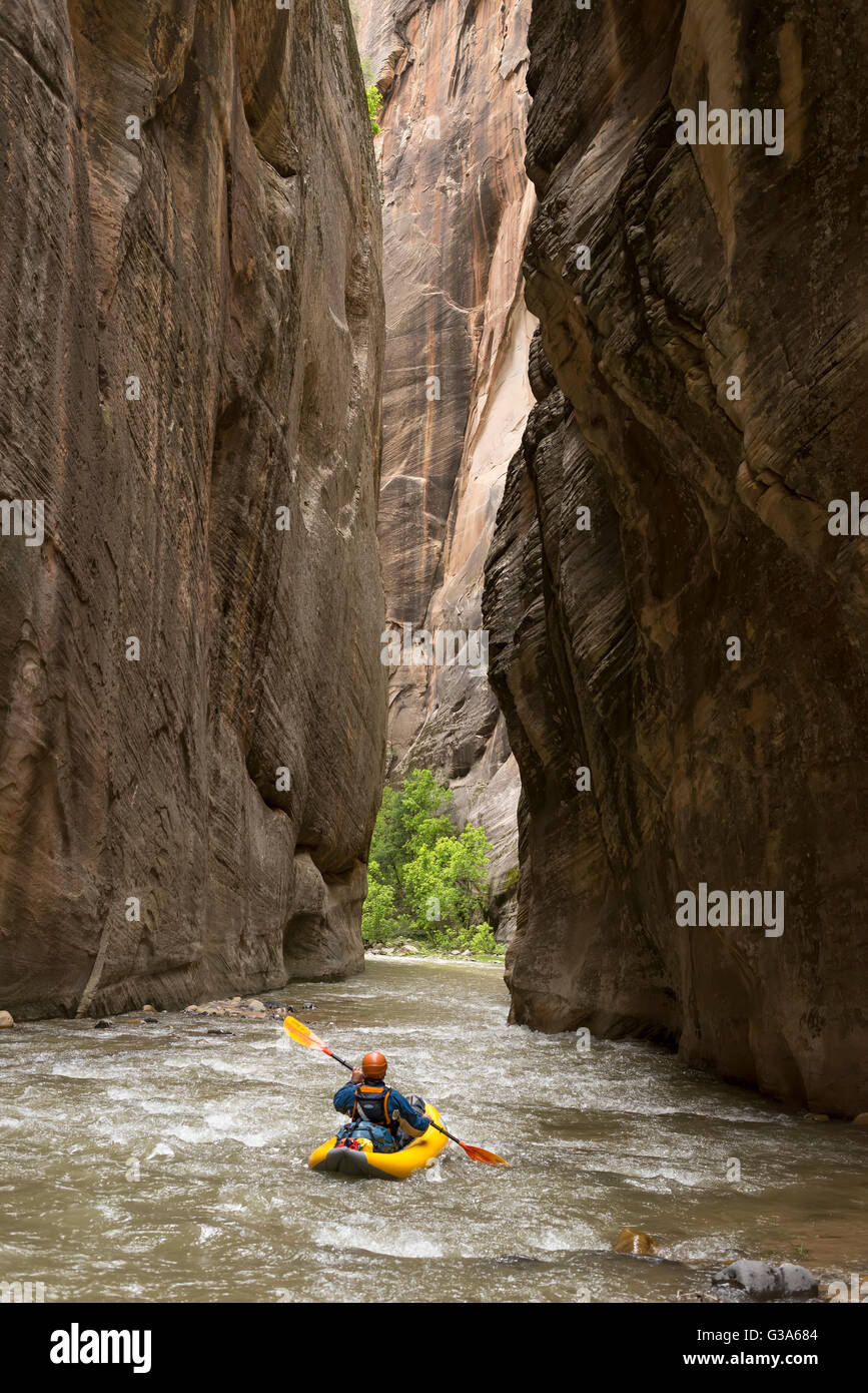 Paddling the narrows of Deep Creek, Utah in an inflatable kayak Stock ...