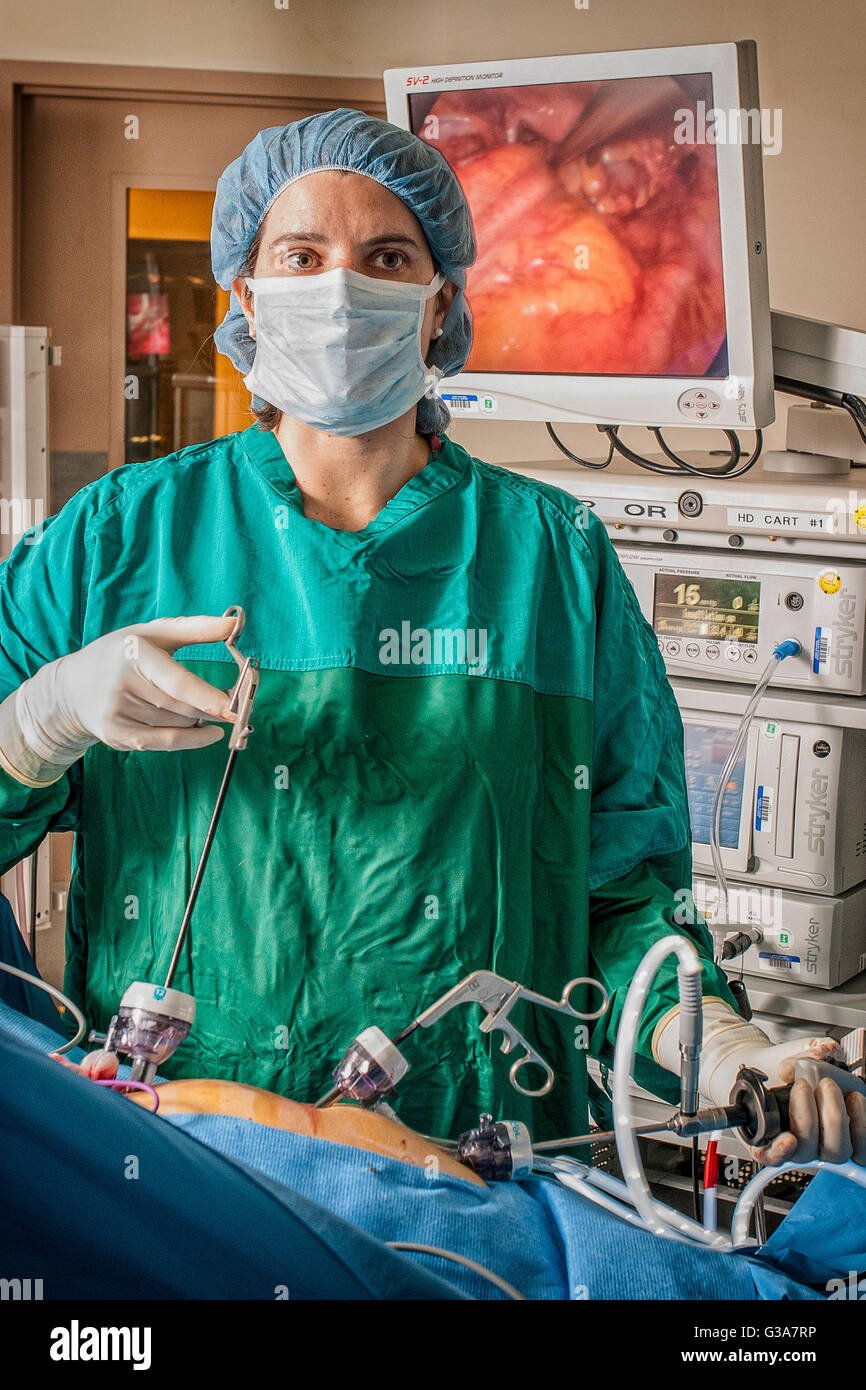 Screen shows view inside patient's body as surgeon performs minimally ...