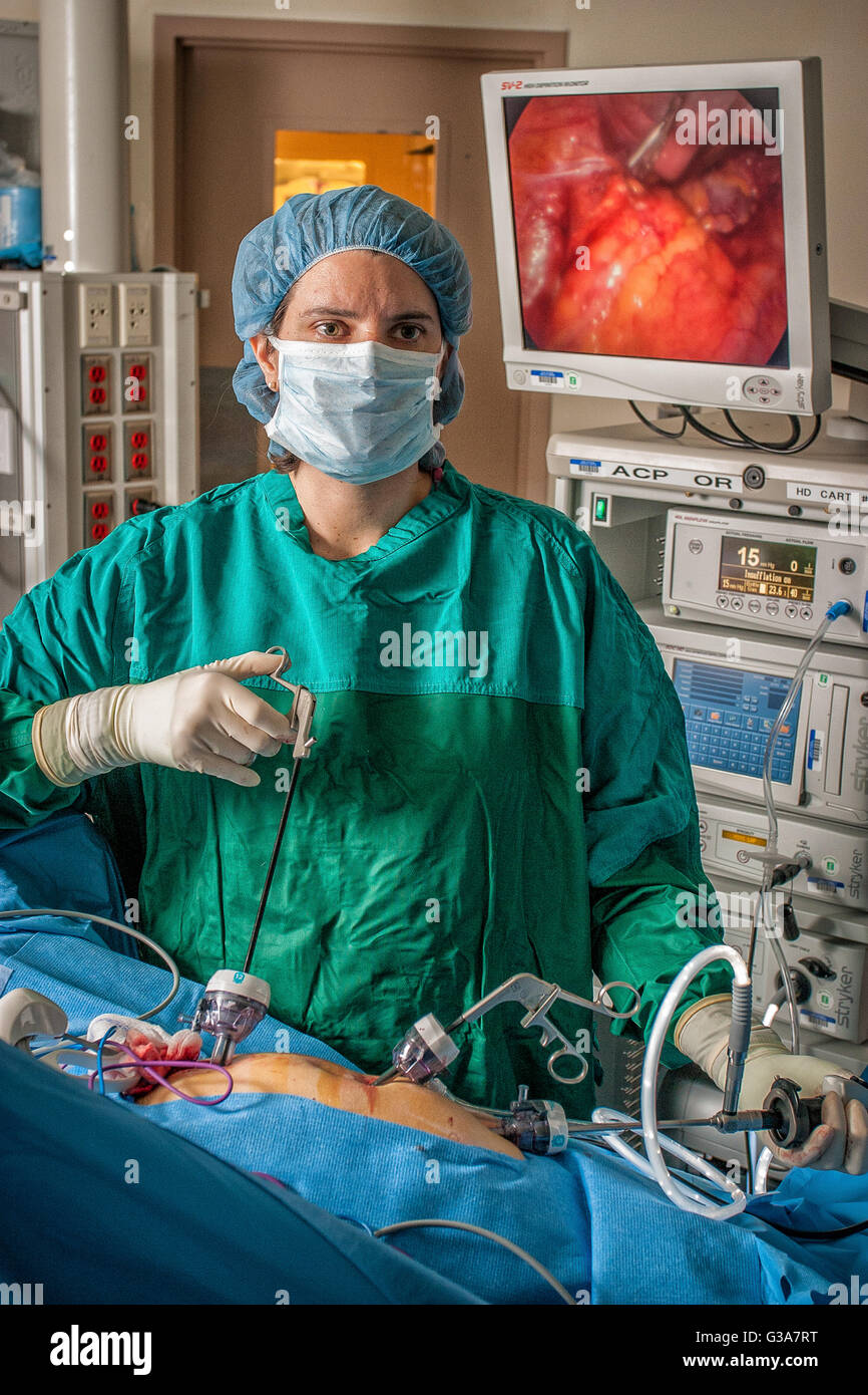 Screen shows view inside patient's body as surgeon performs minimally ...