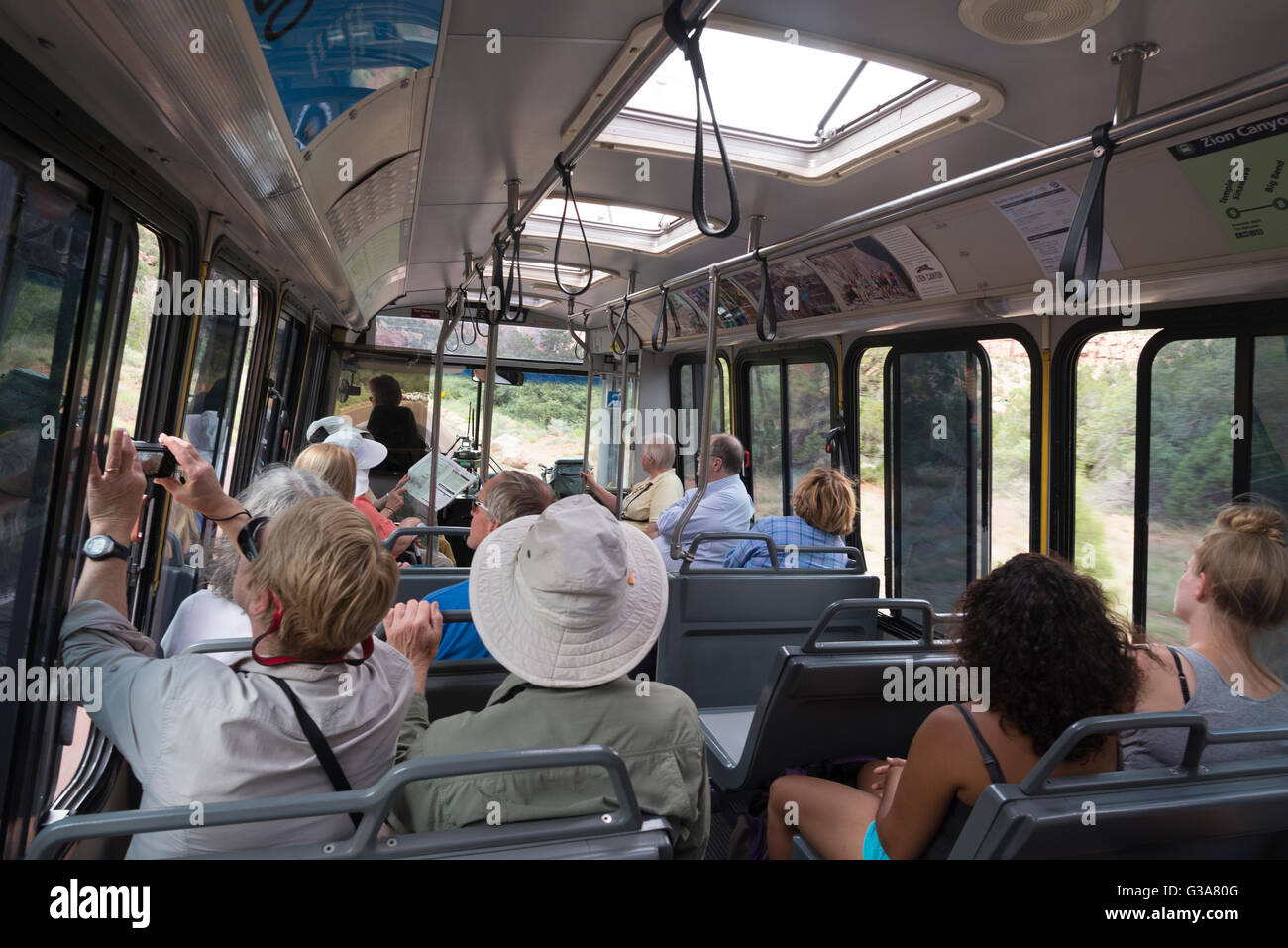 Tourists in shuttle bus hi-res stock photography and images - Alamy