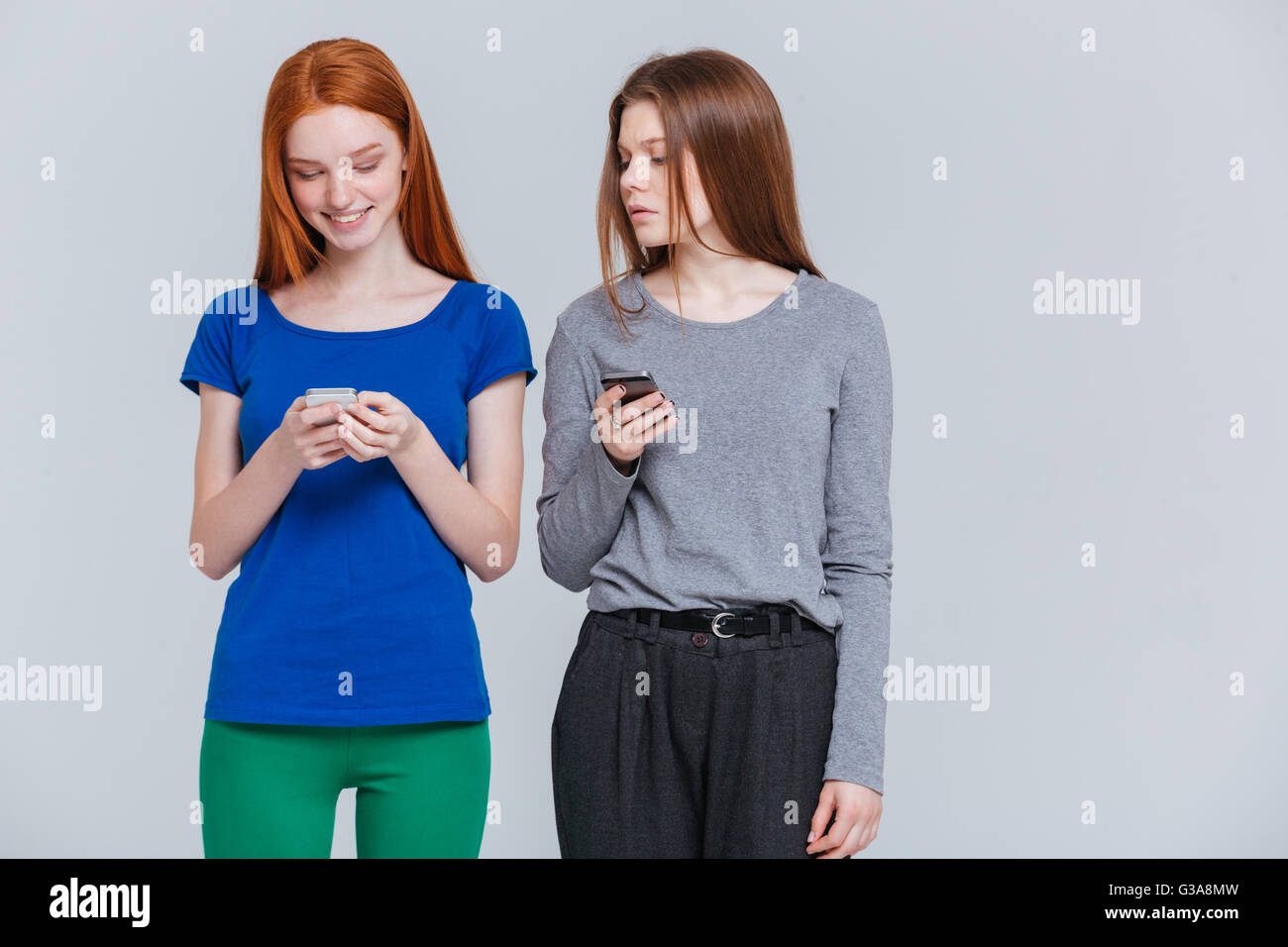 Two people talking sad and happy hi-res stock photography and images ...