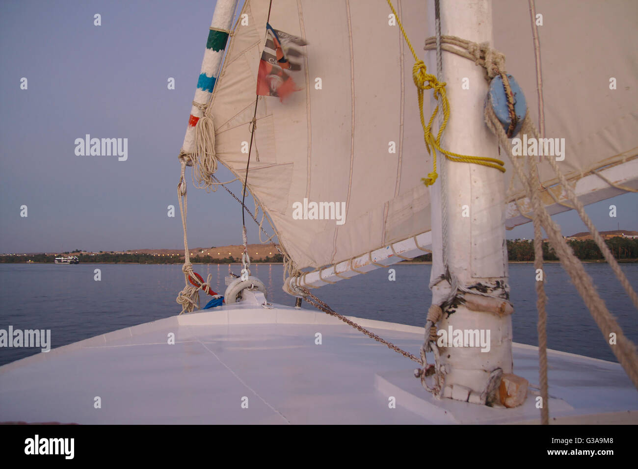 Felucca cruise on the river Nile in evening light, between Aswan and ...