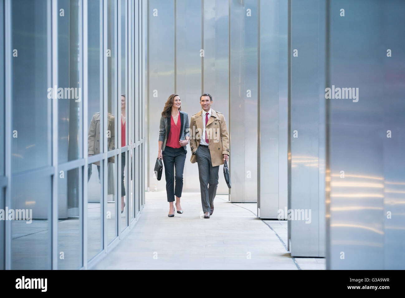 Business people walking hi-res stock photography and images - Alamy