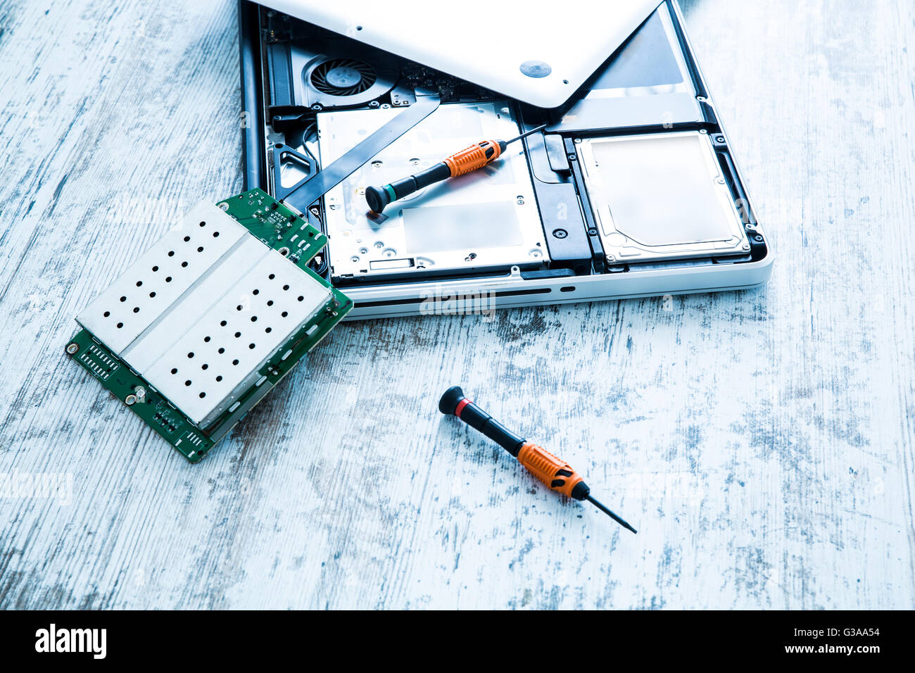 A open laptop getting repaired Stock Photo - Alamy