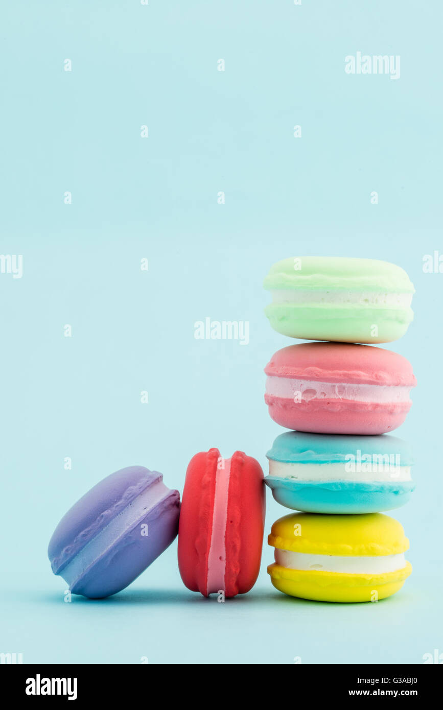 French colorful macarons stacks on pastel background, copy space Stock ...