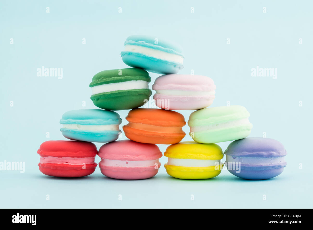 French colorful macarons stacks on pastel background, copy space Stock ...