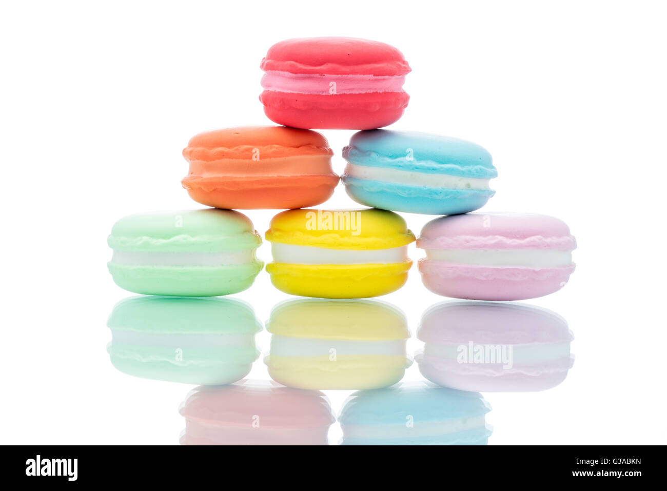 French colorful macarons stacks on white background, copy space Stock ...