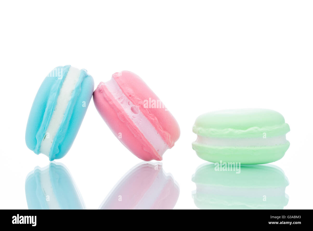 French colorful macarons stacks on white background, copy space Stock ...