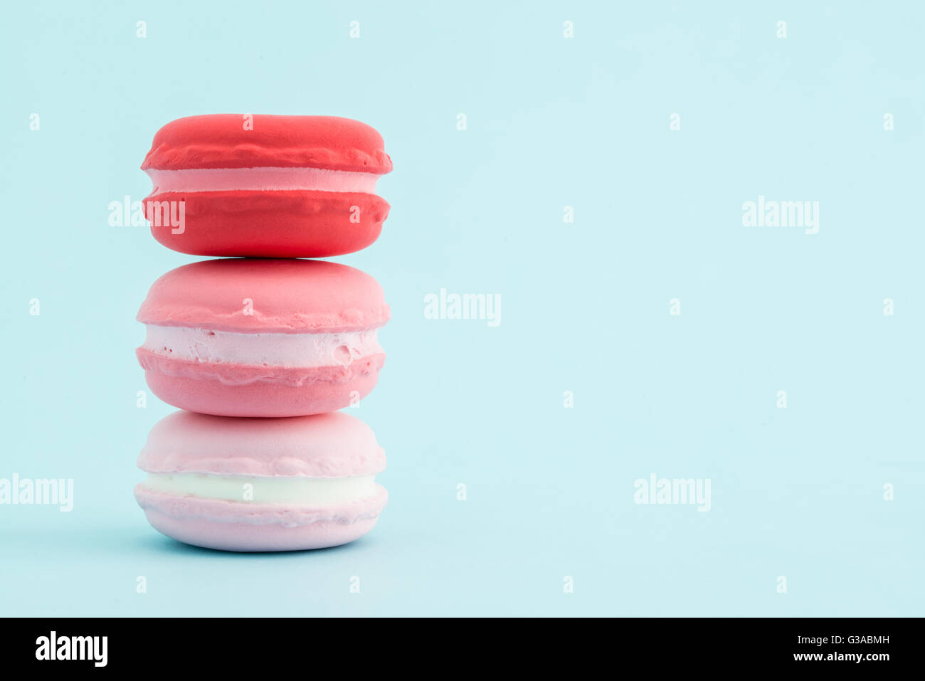 French colorful macarons stacks on pastel background, copy space Stock ...