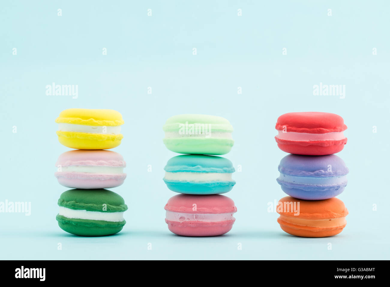 French colorful macarons stacks on pastel background, copy space Stock ...