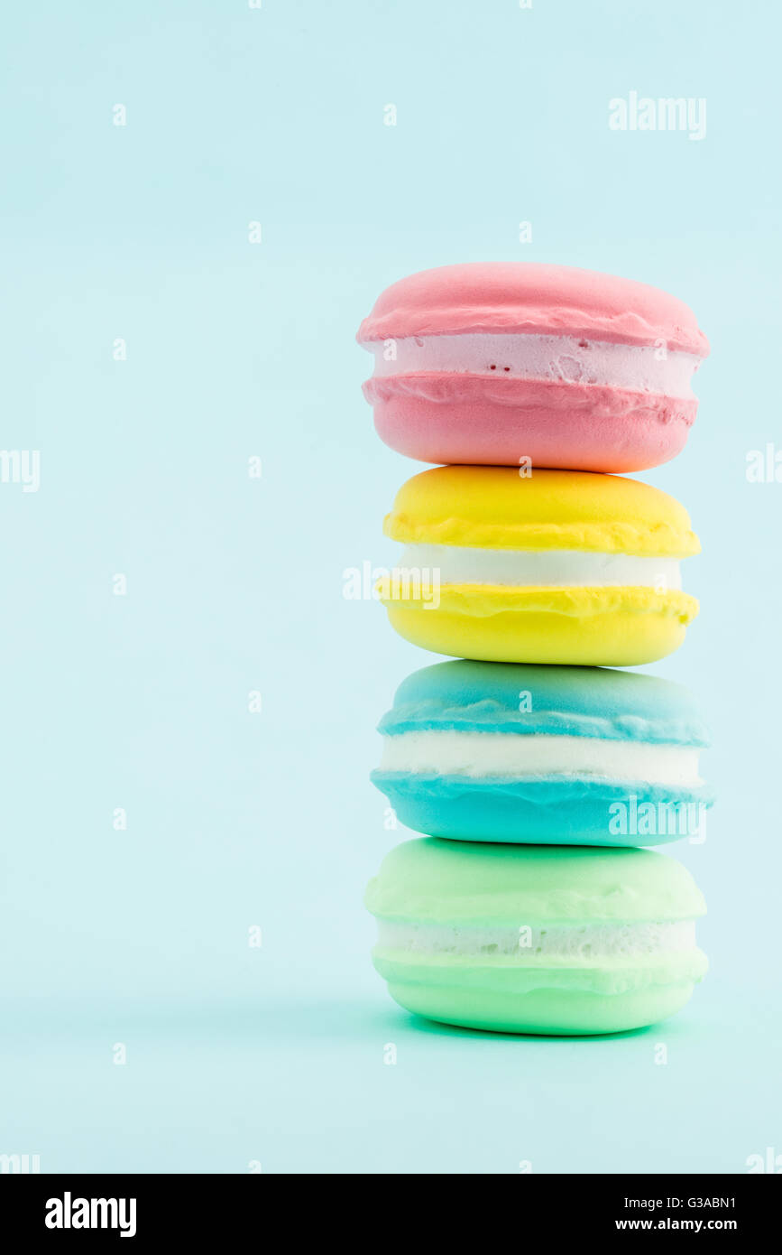 French colorful macarons stacks on pastel background, copy space Stock ...