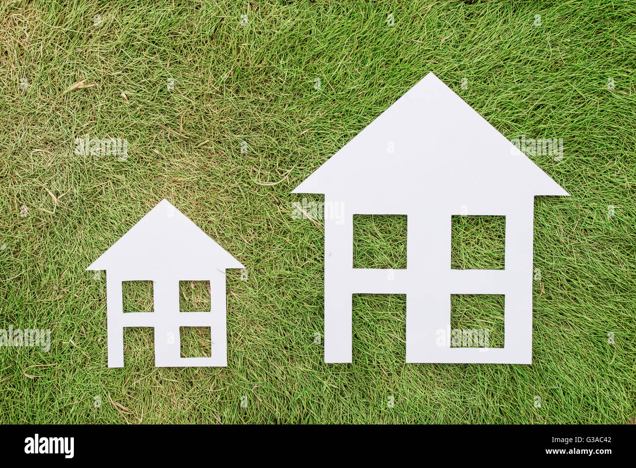 Buying a house with a home environment, green living Stock Photo - Alamy