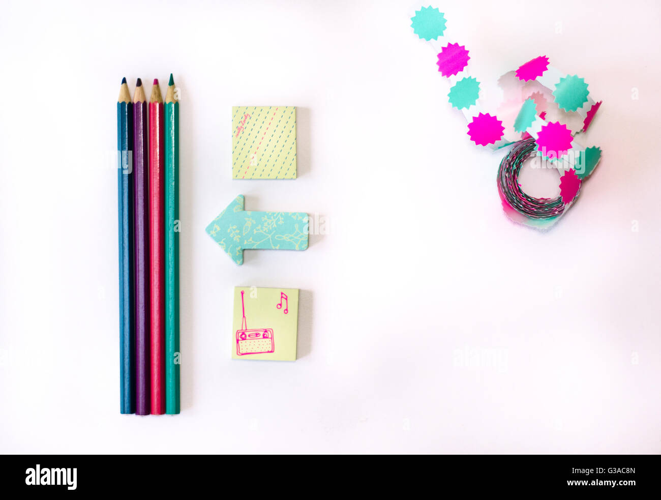 pencils, post it notes and notebook, on desk Stock Photo - Alamy