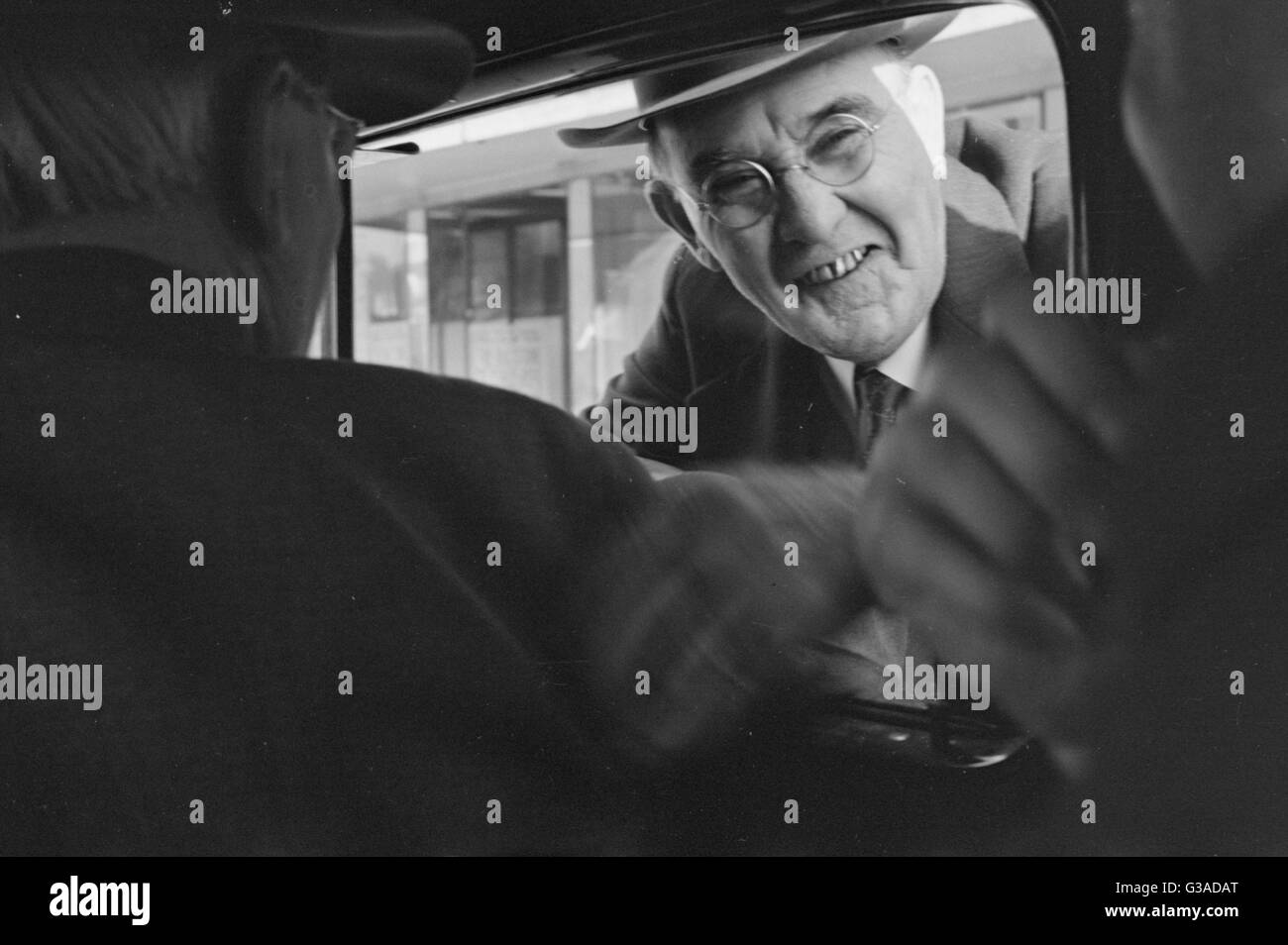 Men looking in window Black and White Stock Photos & Images - Alamy