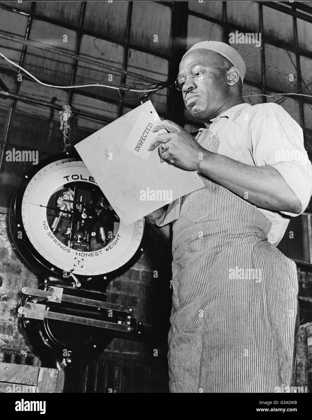 Negro factory inspector Stock Photo - Alamy