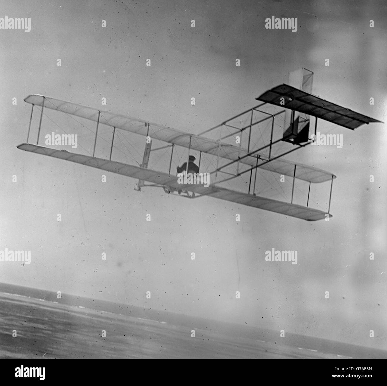 Three-quarter left rear view of glider in flight at Kitty Ha Stock ...