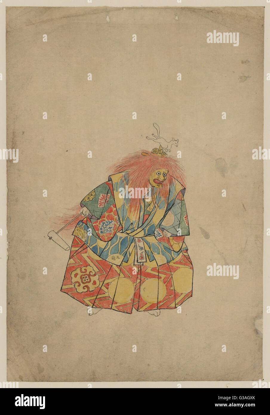 A clown wearing colorful costume and mask, with wild hair an Stock ...