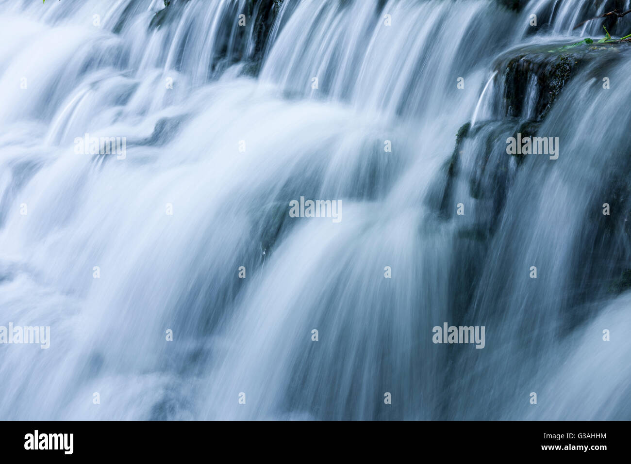 Water cascading over a weir with motion blur. Tumbling Weir on the ...