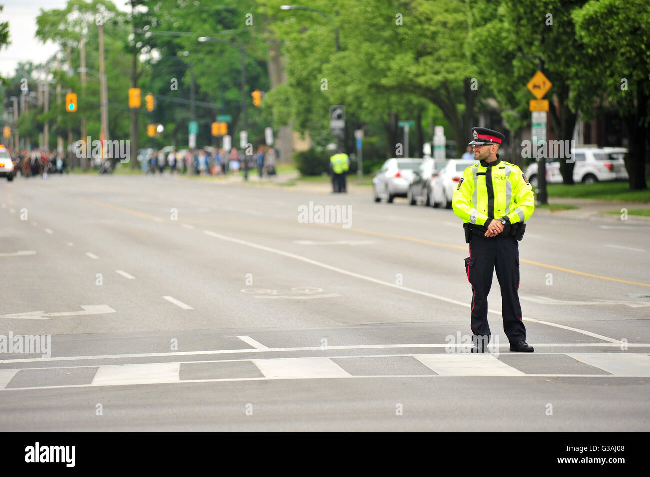 Police officer standing behind police hi-res stock photography and ...