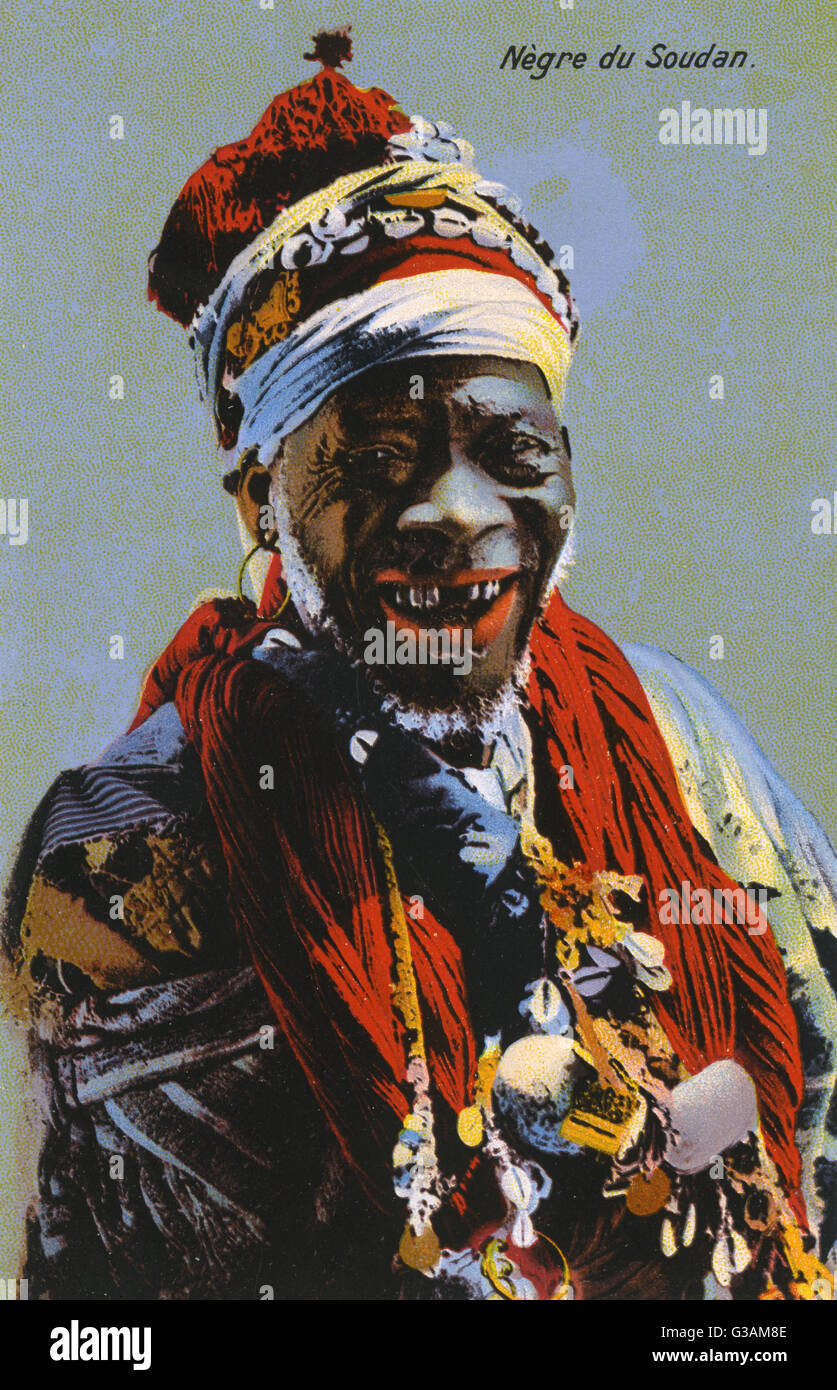 Sudanese old man with a very toothy grin Stock Photo - Alamy