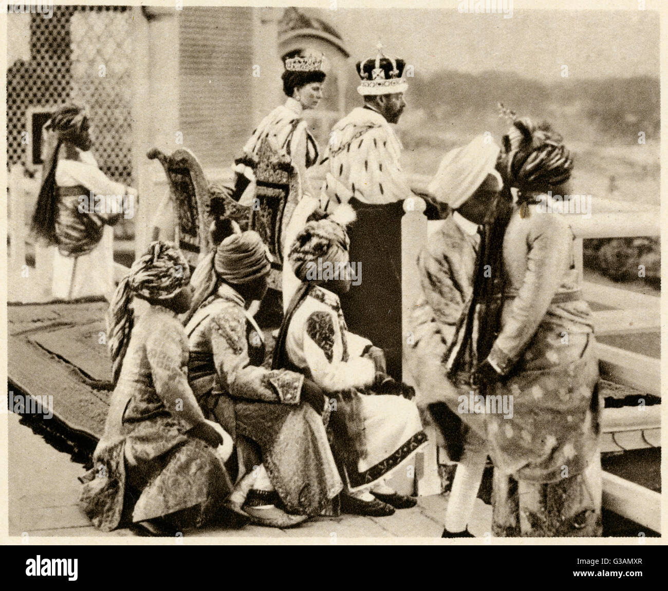 King Emperor (George V) and Queen Empress (Mary) seated upon the dais ...