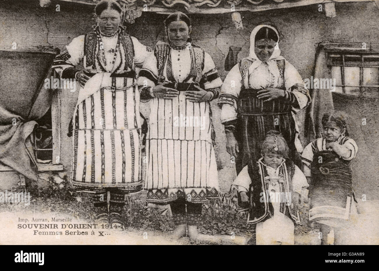 Serbian women and children in traditional costume Date: circa 1910s ...