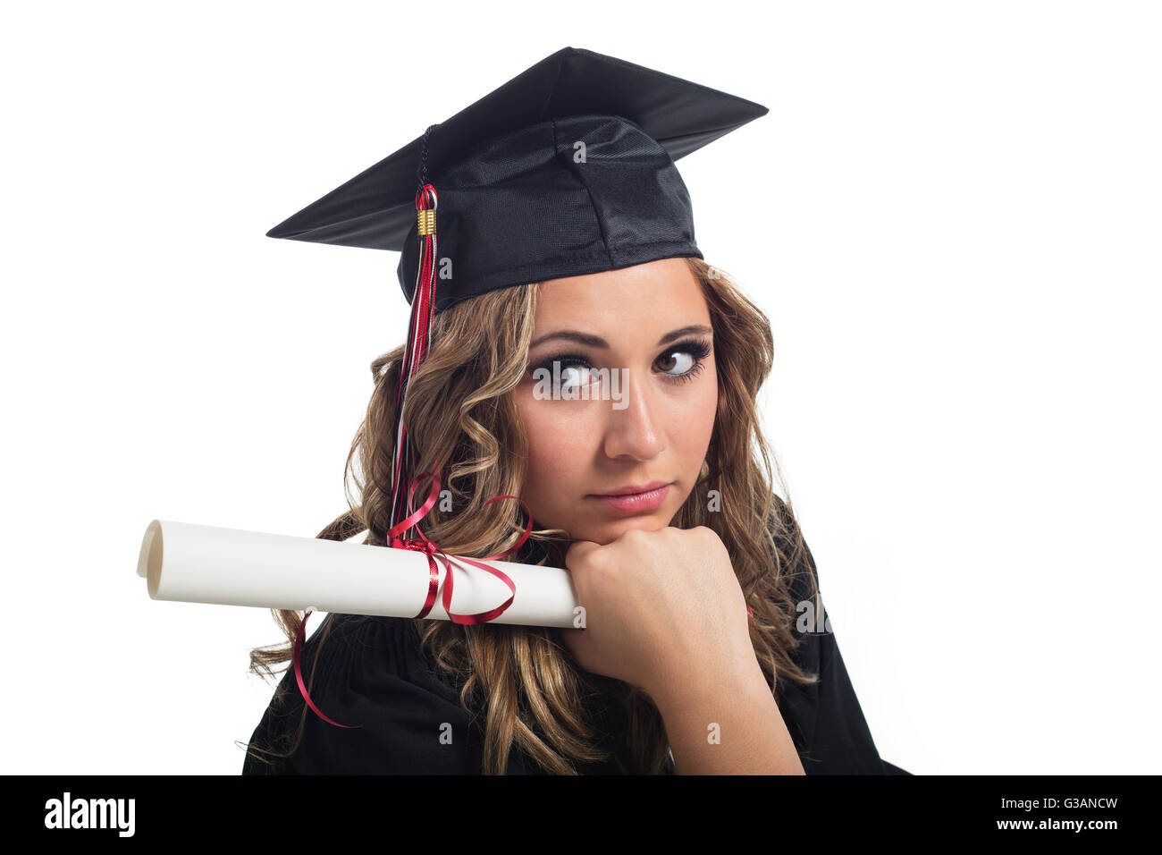 Portrait of a young woman graduate holding her diploma and ...