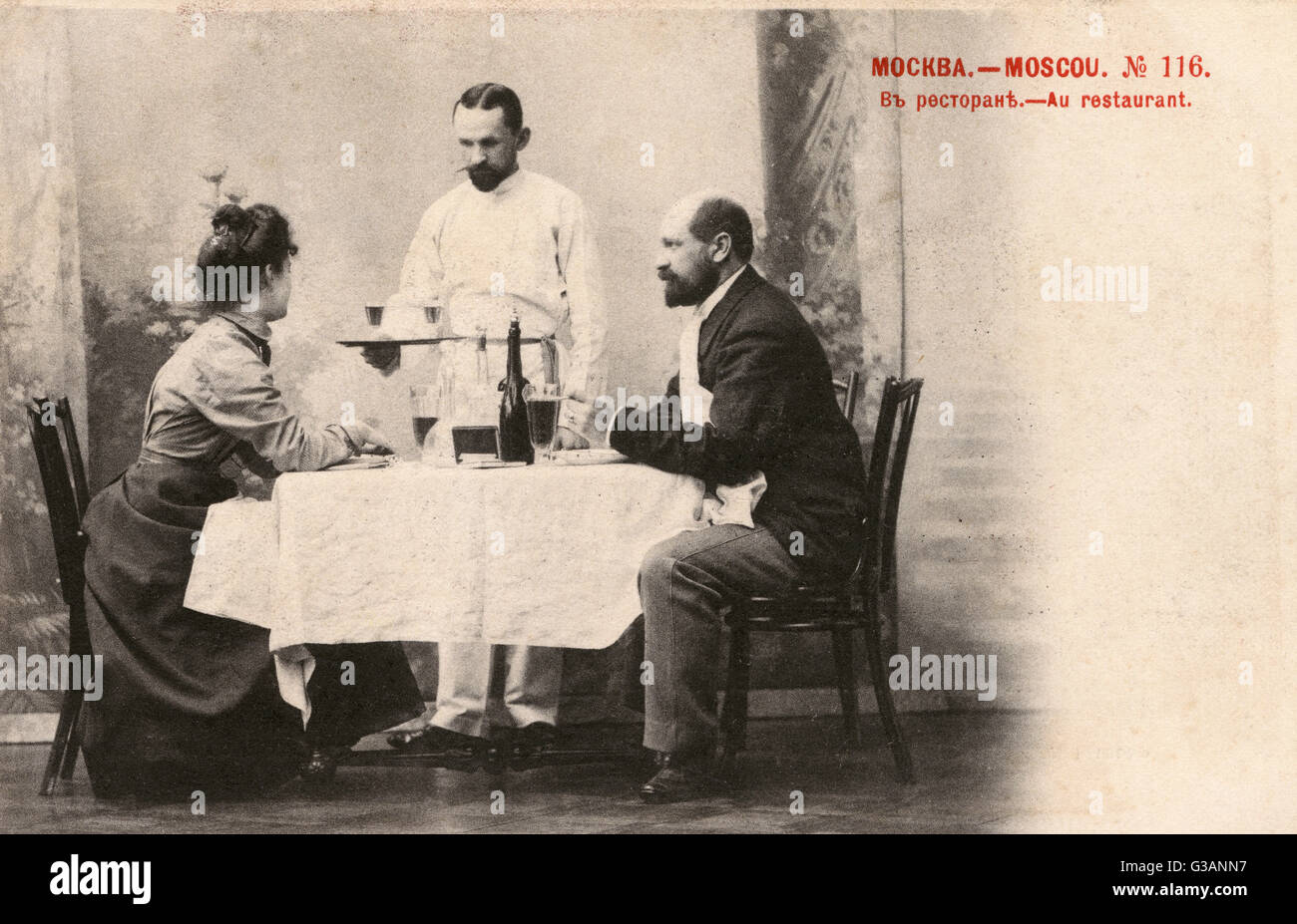 Russian Restaurant scene - Waiter delivering the aperitifs Stock Photo ...