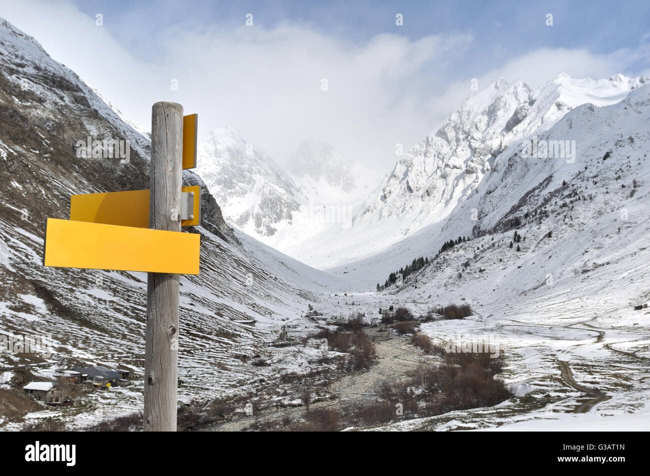hiking sign on background snowy mountain in Alps Stock Photo - Alamy