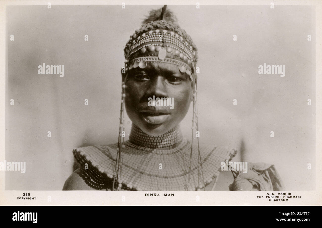 Dinka Man with elaborate head and neck decoration - Sudan Stock Photo ...