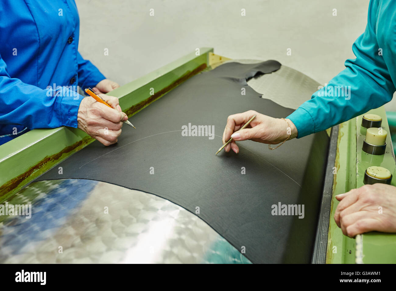 Quality control in production of shoes Stock Photo - Alamy