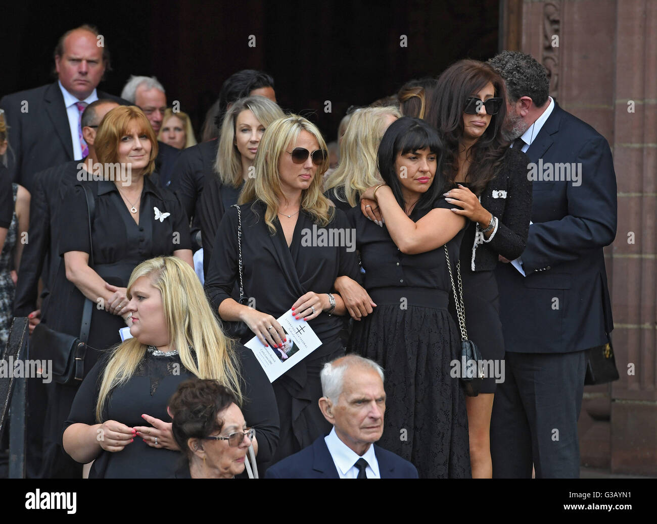 Mourners leave Liverpool Cathedral following the funeral of television ...