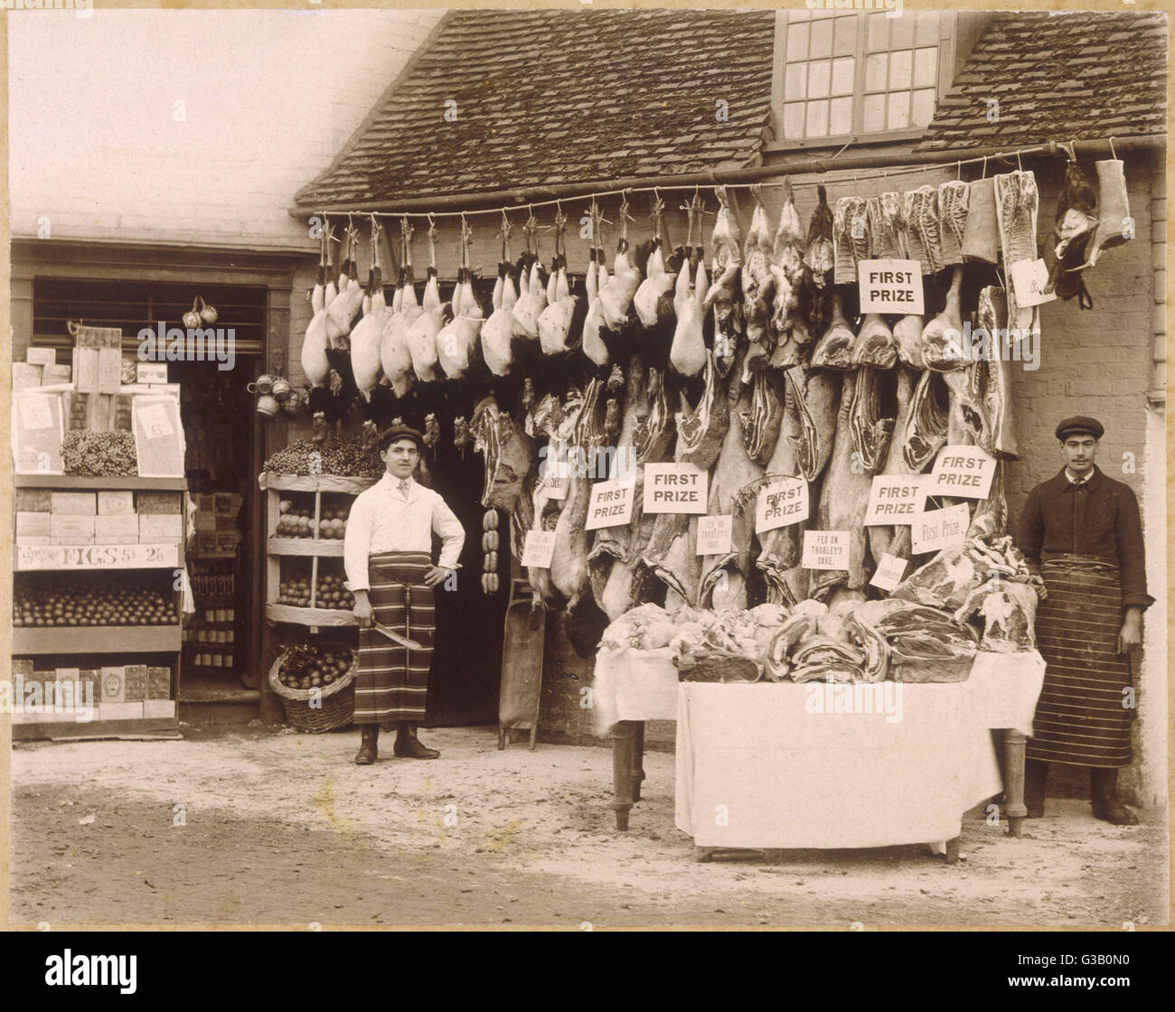 A fine display of meat displayed outside a butcher's shop. Much of the ...