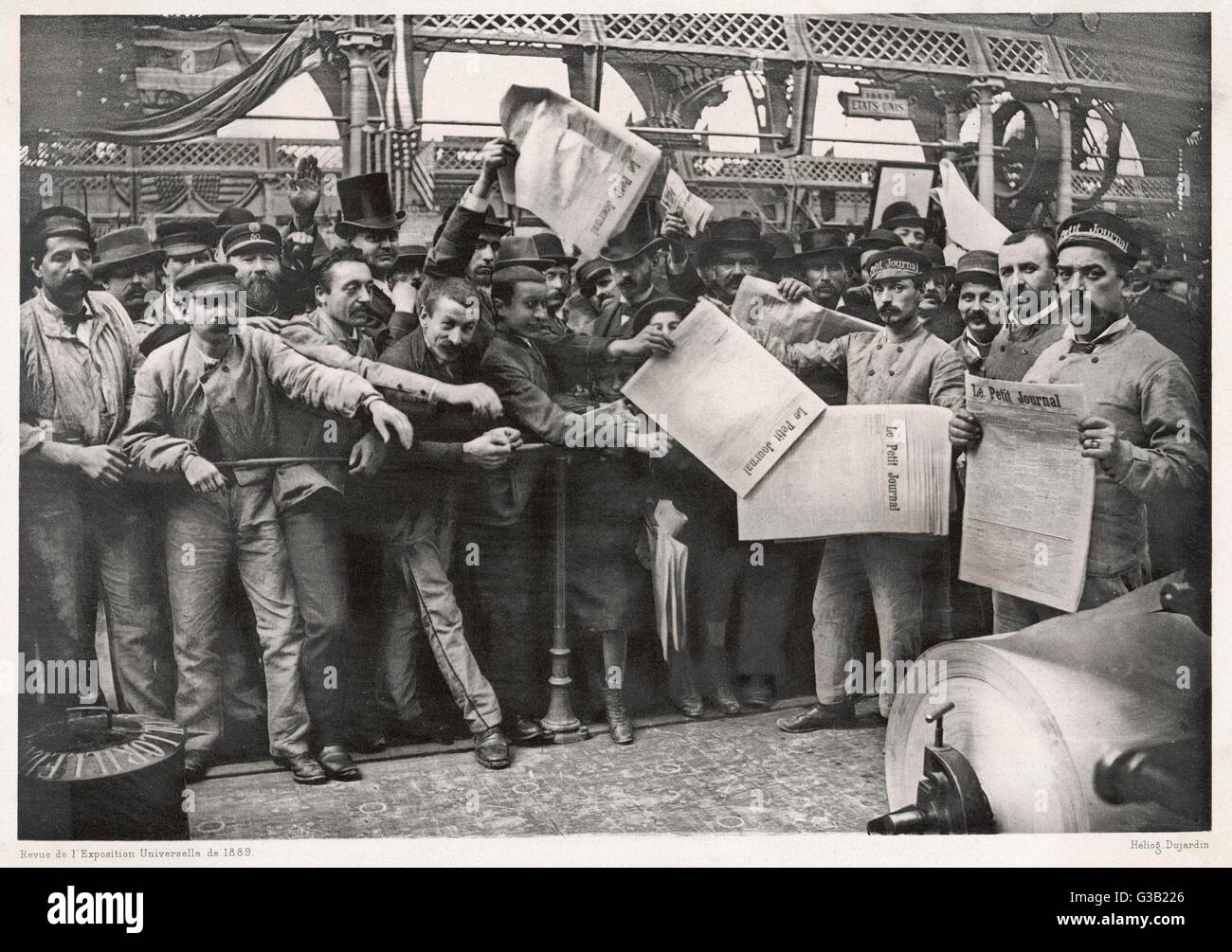 Newspapermen handing out copies le petit journal hi-res stock ...
