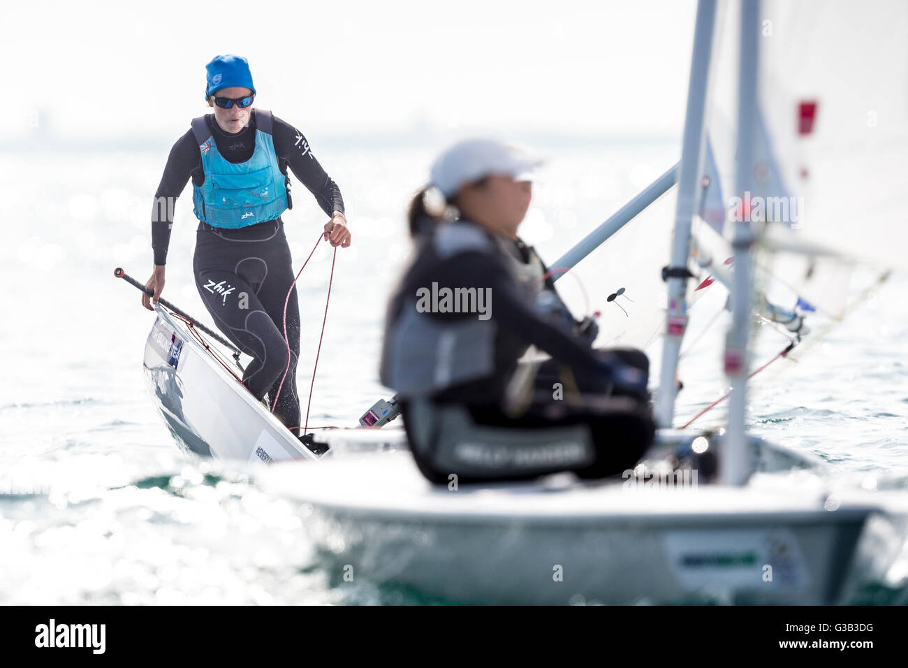 Team GBR Olympic sailor Alison Young (blue hat) pictured racing her ...